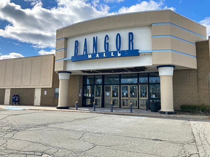 The Bangor Mall stands as a testament to retail resilience, its blue-trimmed entrance welcoming shoppers to this community hub.