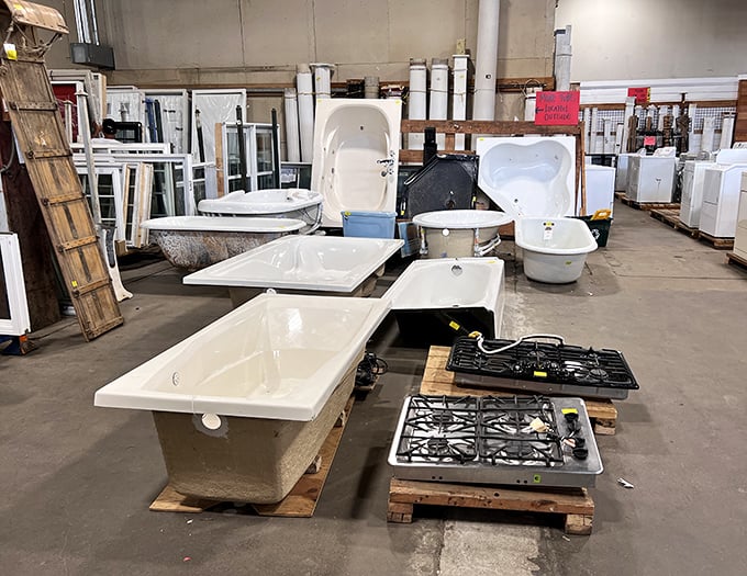 Bathtubs and cooktops sharing floor space in the most unexpected bathroom-kitchen mashup you'll see outside a hardware store.
