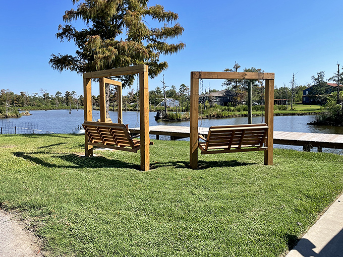 Waterfront swings at Bayou Marino offer front-row seats to nature's daily performance. Retirement's version of box seats, minus the ticket price.