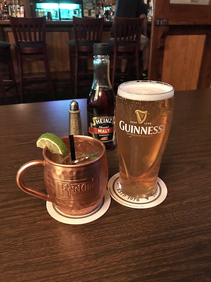 A perfectly poured Guinness alongside a copper mug Moscow Mule&mdash;proof that Ireland and Russia can peacefully coexist.