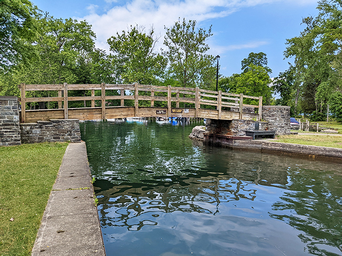 A bridge over tranquil waters connects more than just shorelines. Crossing here feels like stepping into a scene from "The Bridges of Madison County"—minus the drama.