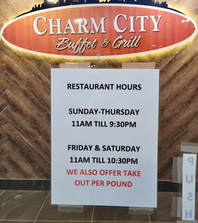 The hours sign reveals the buffet's generous schedule, proving that good things come to those who arrive hungry at reasonable times.