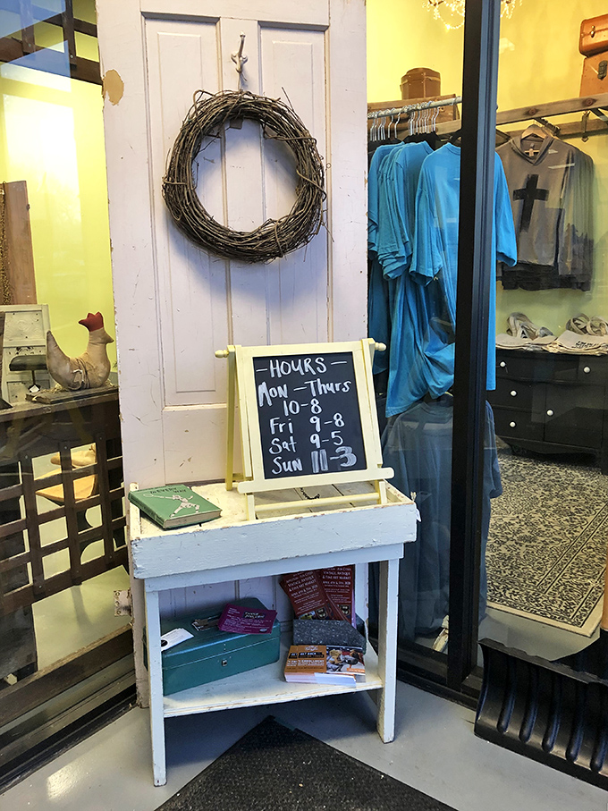 Even the hours sign is vintage-chic. The door says "Welcome," but the wreath whispers, "Your credit card is about to get a workout."