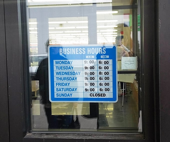 The business hours sign&mdash;memorize it like a favorite recipe. Wednesday nights offer extended hours for those who need their mid-week thrifting fix.