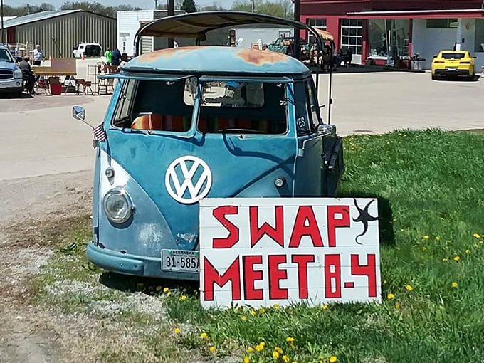 The iconic VW bus announces another treasure hunt. This vintage vehicle serves as the perfect herald for a day of swap meet discoveries.
