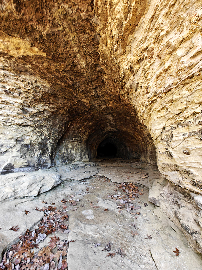 Nature's own secret passage beckons the adventurous to explore, though claustrophobes might prefer the more open trail options.