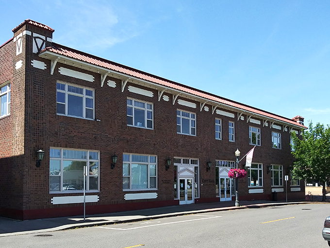 Centralia's Municipal Court building stands as a handsome example of civic architecture, where red brick and symmetry create a sense of small-town permanence.