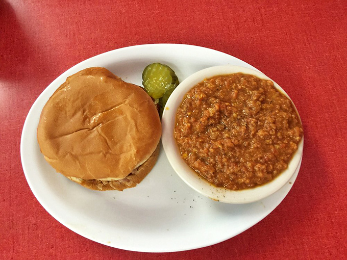 The classic BBQ sandwich with Brunswick stew&mdash;a duo that's been making Georgians smile longer than most marriages last. Pure Southern harmony.