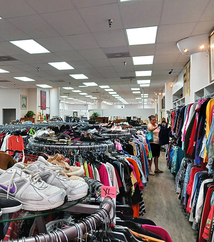 Shoppers navigate the clothing forest with the focus of professional bargain hunters&mdash;eyes scanning for designer labels among the rainbow of options.
