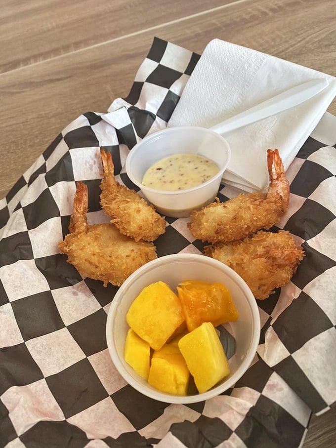 Coconut shrimp that delivers tropical vacation vibes with each bite. The mango chunks are like little squares of sunshine.