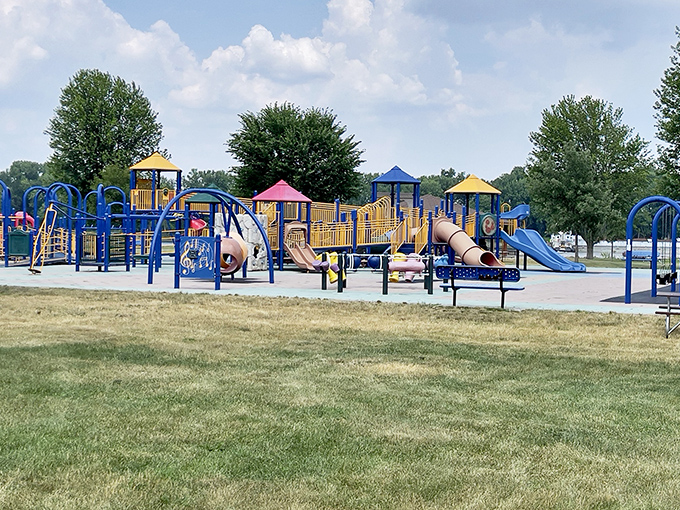 Colvill Park's playground is where grandparents earn superhero status by pushing swings until their arms threaten to secede from their bodies.