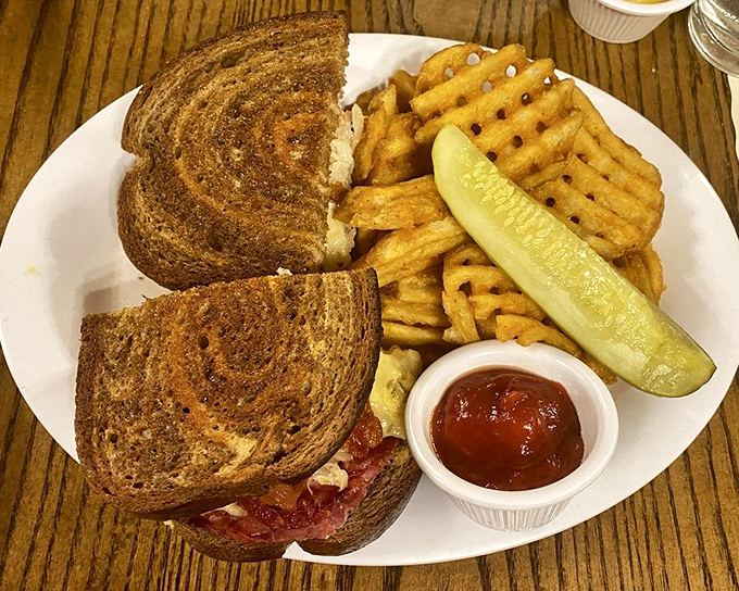 This Reuben sandwich has architectural integrity that would impress Frank Lloyd Wright. The pickle stands guard like it means business. 