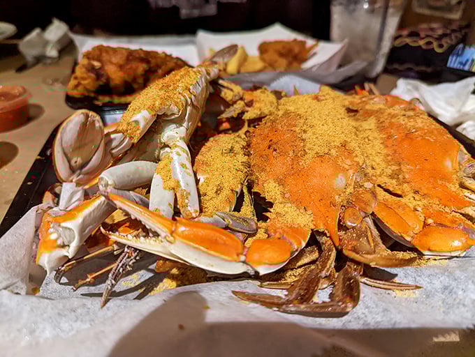 Maryland blue crabs dusted with signature spice blend&mdash;nature's perfect puzzle that rewards patient diners with sweet, tender meat.