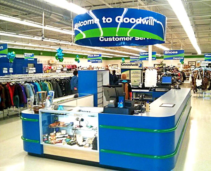 The customer service counter stands ready to process your cart full of treasures and impressive savings receipts.
