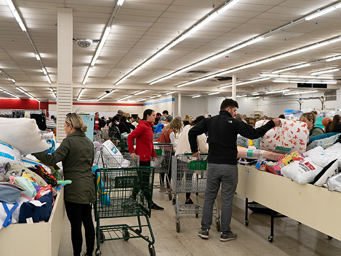 Friday morning at Krazy Bins looks like Black Friday without the trampling. The focused expressions say it all&mdash;serious shopping requires serious concentration.