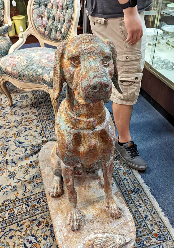 This weathered canine statue has the dignified expression of a good boy who's seen decades come and go, waiting for the right forever home.
