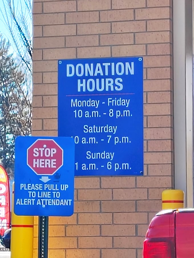 The donation hours sign&mdash;the unsung hero of the thrift ecosystem, ensuring the treasure cycle continues for generations of bargain hunters.