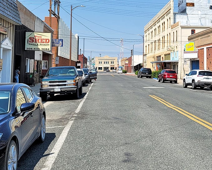 Downtown side streets where parking is free and shopkeepers still thank you for your business like they actually mean it.