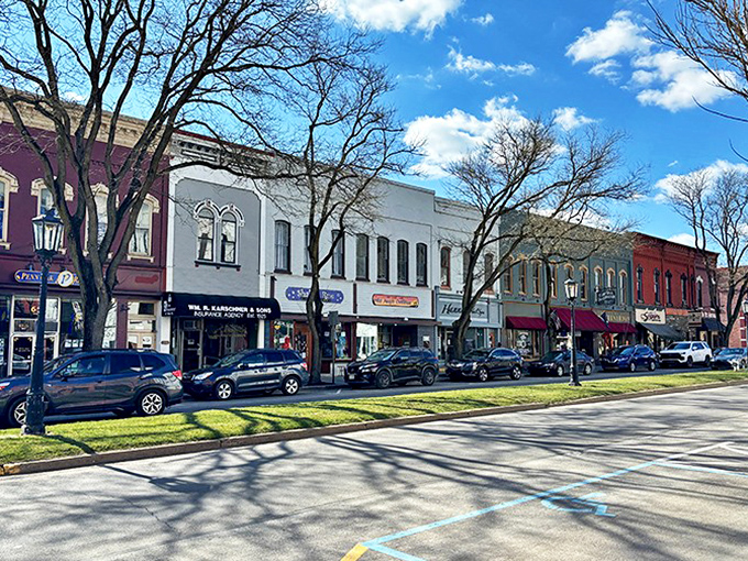 Downtown Wellsboro's colorful storefronts create a vibrant streetscape where window shopping becomes an actual activity rather than just something to do while your phone charges.