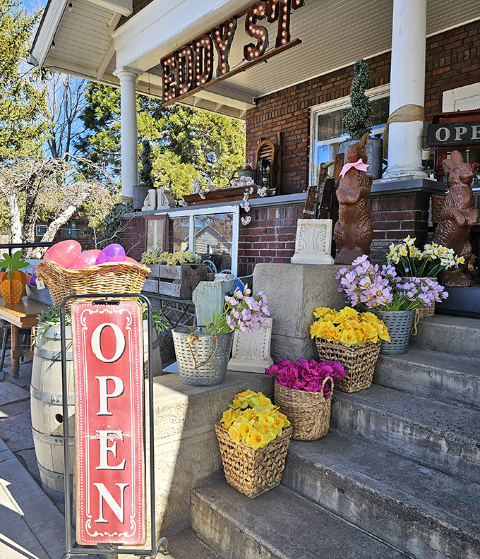 Eddy Street Vintage Market's flower-adorned entrance is like your eccentric aunt's porch &ndash; colorful, inviting, and promising treasures you didn't know you needed.