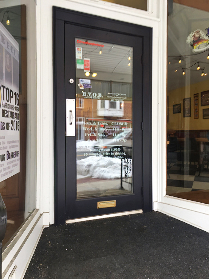 The entrance to Road Hawg might as well be a portal to flavor country. That door has seen countless happy customers enter hungry and exit euphoric.