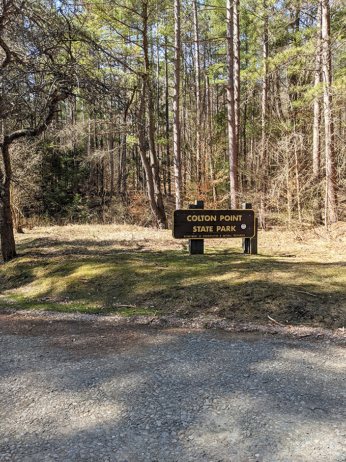 The unassuming entrance sign to Colton Point &ndash; where adventures begin with a humble hello before nature's grand reveal.