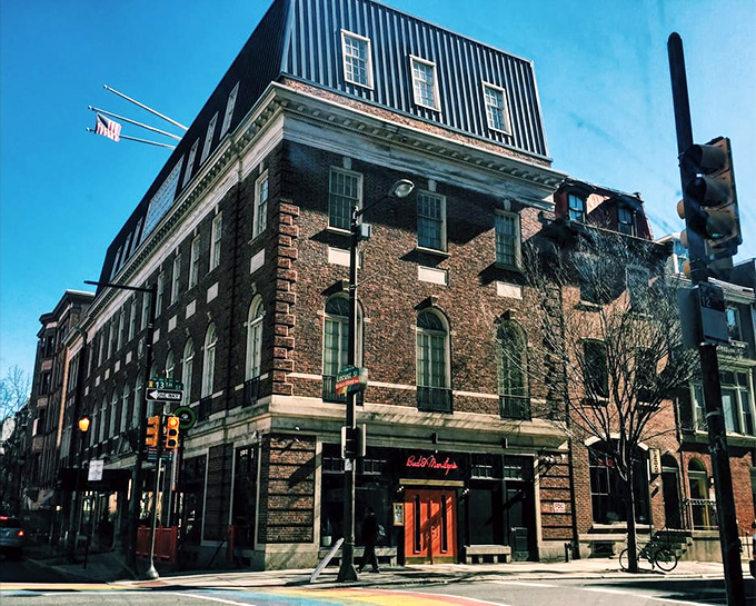 The building's historic architecture provides a striking contrast to the modern restaurant within. That corner location makes it impossible to miss when strolling through the neighborhood.