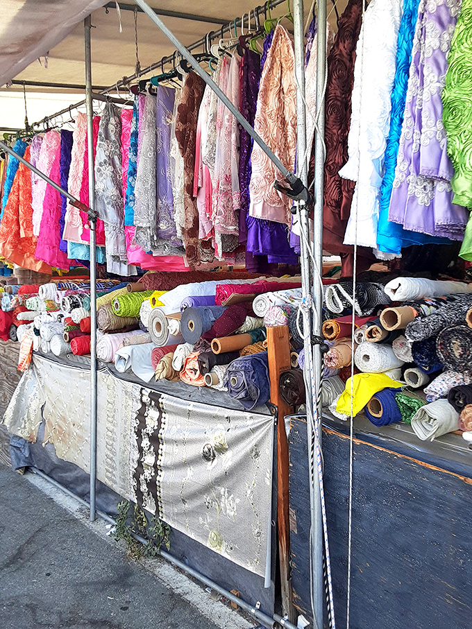 Fabric heaven for DIY enthusiasts. More textile options than your sewing machine can handle, arranged in a rainbow of possibility.