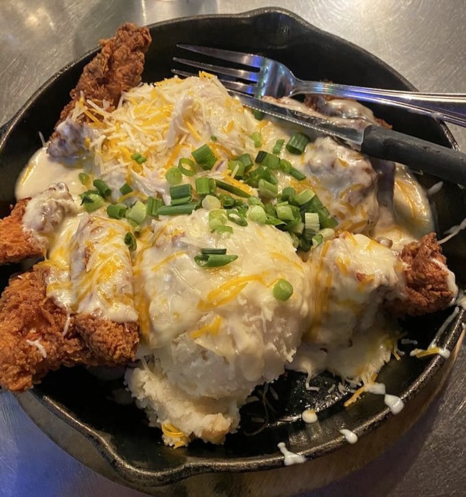 Comfort food elevated to an art form&mdash;fried chicken nestled on creamy mashed potatoes under a blanket of cheese. Nap scheduling recommended afterward.