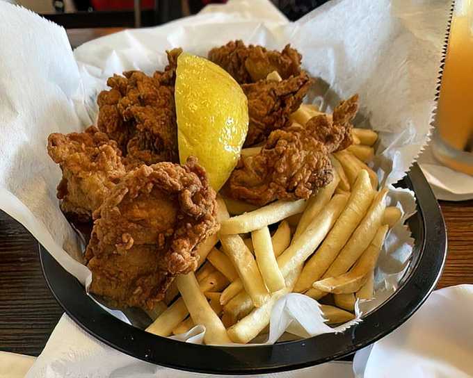 Fried oysters and fries—the beach basket that launched a thousand food comas. Proof that sometimes the simplest pleasures are worth every calorie-counting apology.