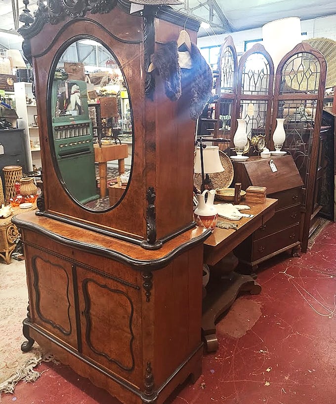 Antique furniture with curves and character that IKEA can only dream about, including a mirror that's seen it all.