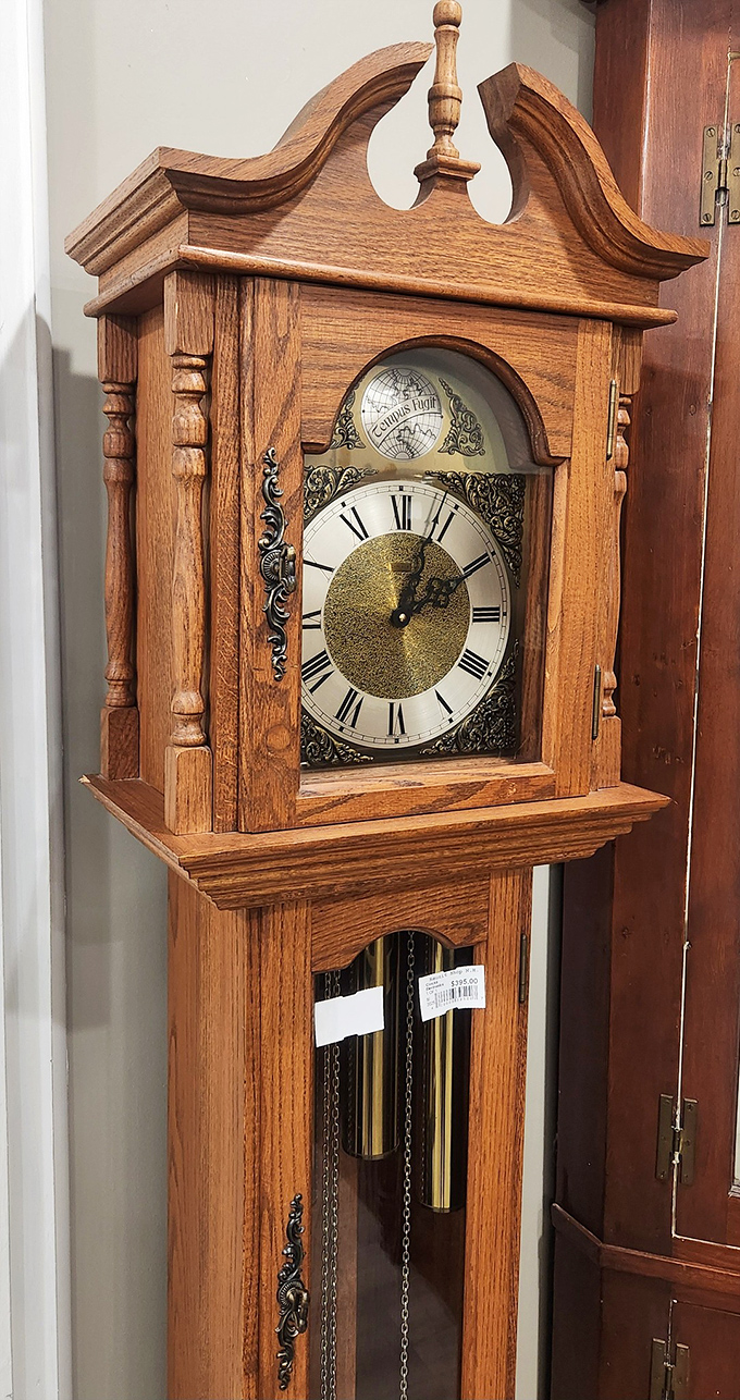 This stately grandfather clock stands guard, ready to bring distinguished timekeeping to your foyer.