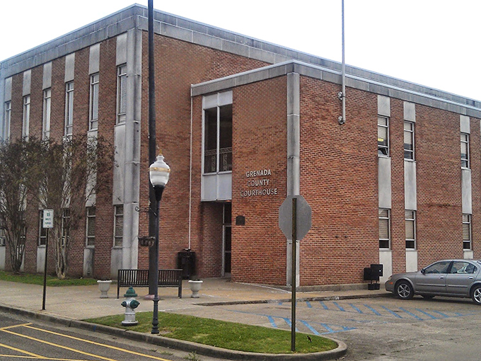 The Grenada County Courthouse stands as a no-nonsense reminder of the town's role as a county seat, blending functionality with mid-century architectural elements.