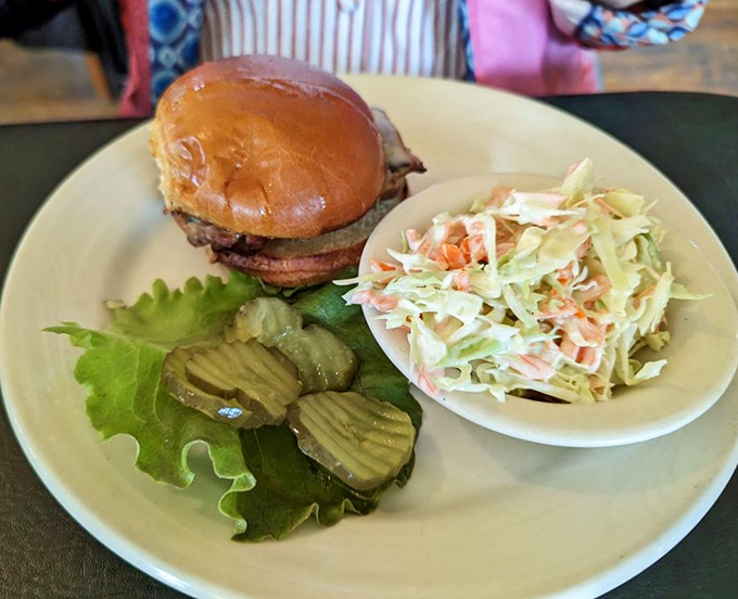 This isn't just a sandwich – it's architectural genius with layers of grilled chicken, fresh vegetables, and the perfect pickle-to-slaw ratio.