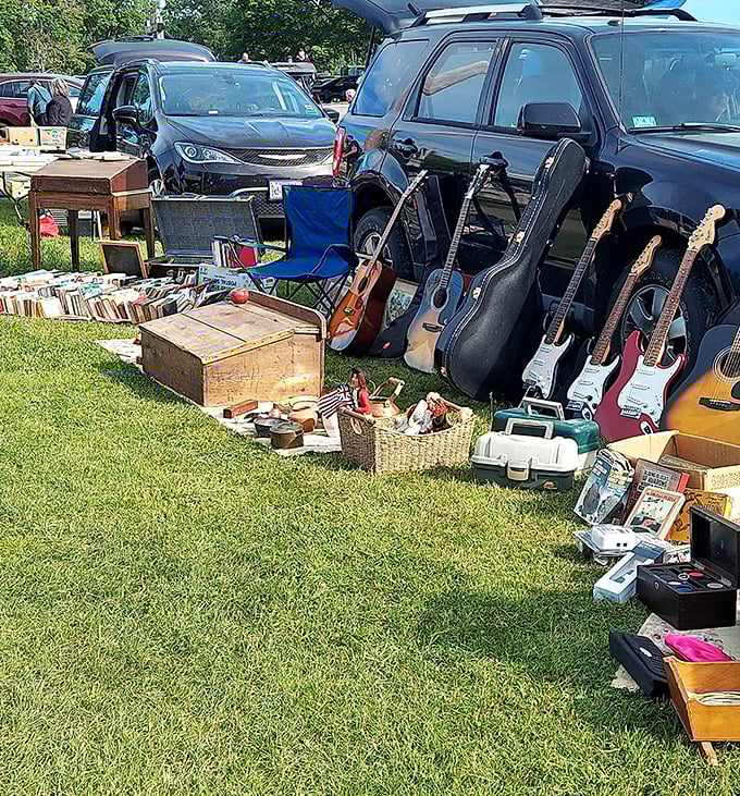 A musician's dream yard sale—these silent six-strings wait patiently for new hands to make them sing their second or third lifetime of songs.