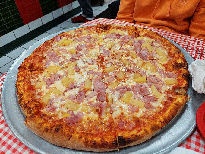 Hawaiian pizza that settles the pineapple debate once and for all: when it looks this good, resistance is futile.