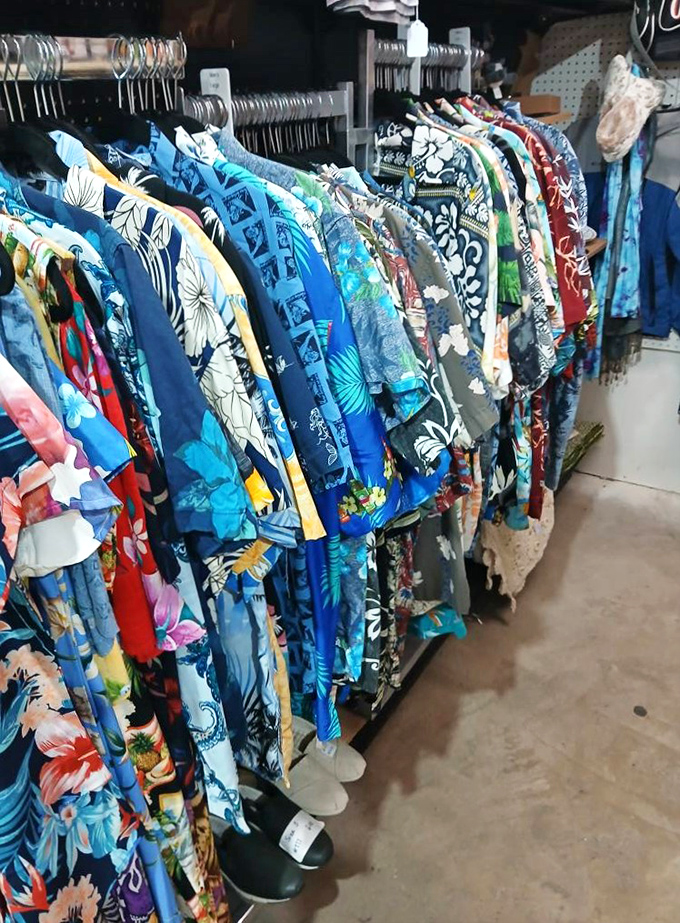 Hawaiian shirt heaven! The unofficial uniform of dads on vacation hangs in technicolor glory, each one louder than the last.