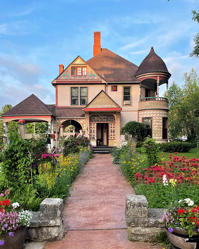 The Scanlan House B&B garden path isn't just an entrance&mdash;it's a promise. Those flowers aren't decorations; they're a welcoming committee with permanent smiles.