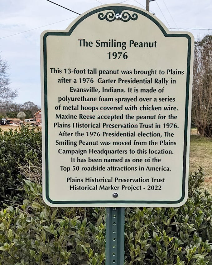 The historical marker tells the peanut's origin story, from campaign prop to beloved roadside attraction.