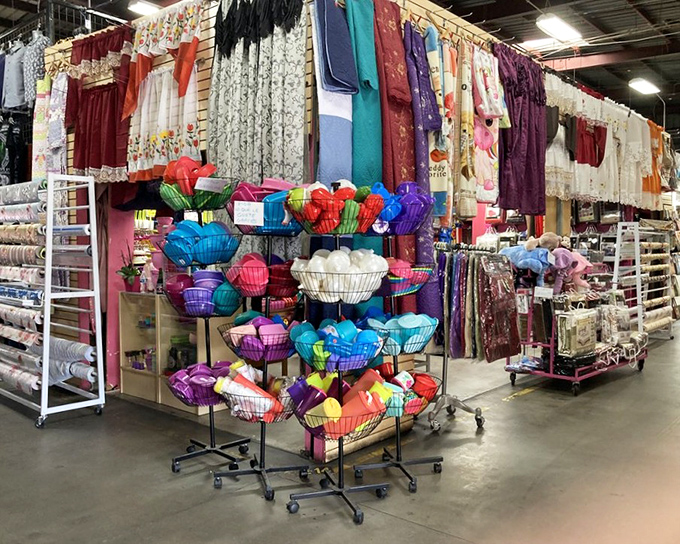 A textile wonderland where tablecloths, curtains, and linens in every imaginable hue transform humble homes into vibrant personal galleries.