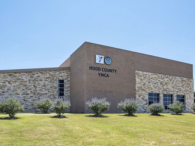 The Hood County YMCA proves small towns can deliver big-city fitness amenities without requiring a personal loan just to maintain your personal best.