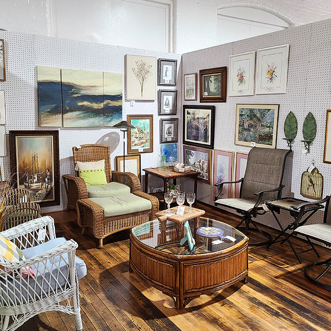 The perfect living room vignette &ndash; where wicker meets wood in a sun-drenched corner that's practically begging you to sit down with a good book.