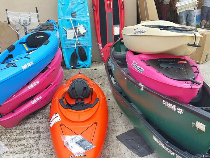 Kayak corner – where water adventures begin and paddling dreams take shape in a rainbow of fiberglass possibilities.