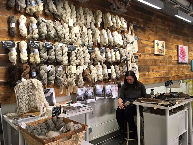 A fiber artist's dream wall. These locally sourced yarns promise sweaters with both a story and style to tell.