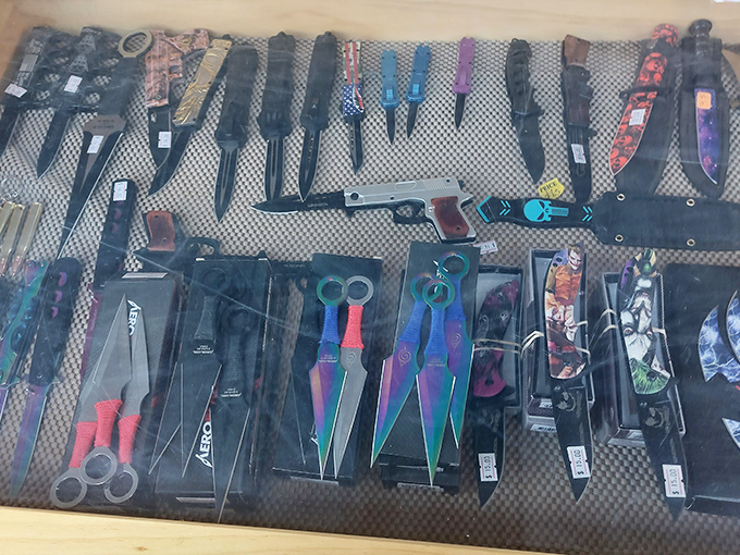 The knife display showcases blades of every purpose&mdash;from practical tools to conversation pieces that would make any collector's heart skip a beat.