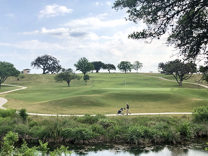 Rolling greens offer golfers Hill Country views that make every swing feel cinematic.
