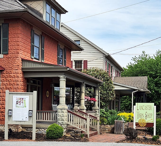 The Lancaster Yarn Shop's cheerful facade promises colorful inspiration inside. Crafters know this is where creativity begins, one beautiful skein at a time.