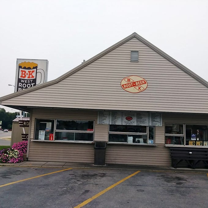 B-K Root Beer stand&mdash;where summer memories are served in frosty mugs. This isn't fast food; it's a time machine disguised as a drive-in.