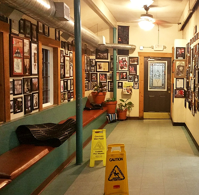 Gallery walls packed with local photographs and memorabilia celebrating Fort Worth's rich community history.
