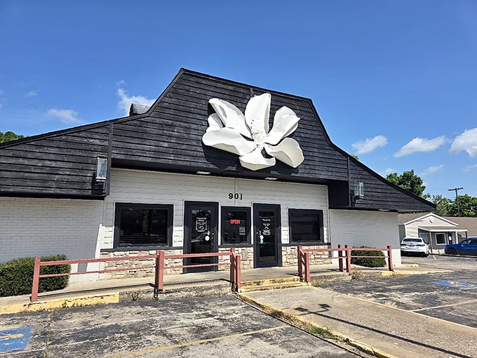 Magnolia Cafe's distinctive flower sign blooms above the entrance, promising homestyle meals that nourish both body and budget.